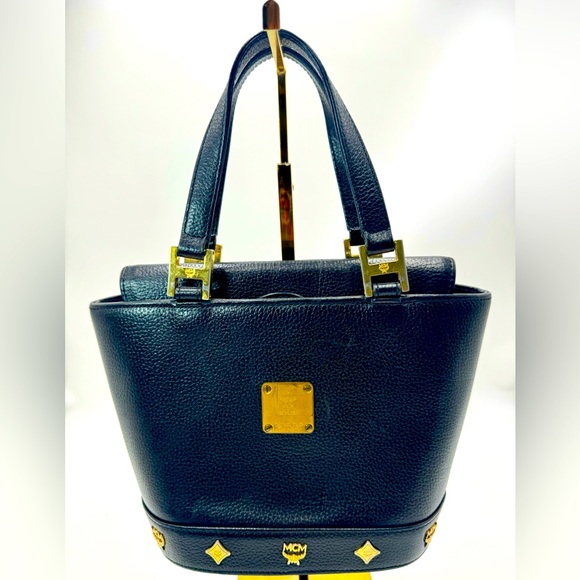 MCM | Bags | Auth Mcm Black Leather Structured Studded Mini Tote Charms ...
